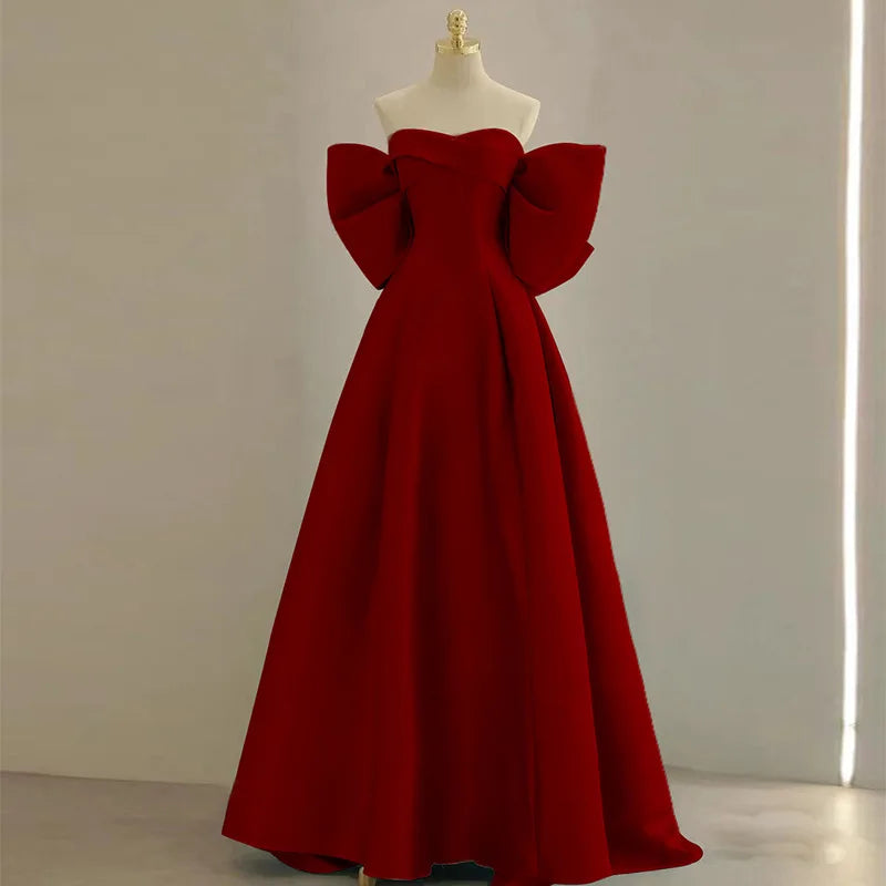 Stunning Red Gown With Dramatic Bow Details on Luulla